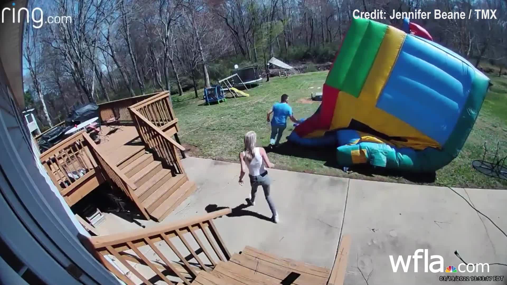 Bounce house flies away, nearly hits child – WFLA